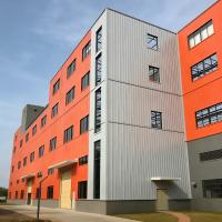 China Windproof Seismic Multi-storey Steel Structure Building Q355 Steel 8-30m Span Prefab Office Tower for sale