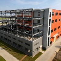 China Windproof Seismic Multi-storey Steel Structure Building Q355 Steel 8-30m Span Prefab Office Tower for sale