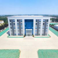 China High Load-Bearing Prefab Multi-level Steel Frame Building Custom Size for Office & Workshop Integration for sale