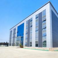 China High Load-Bearing Prefab Multi-level Steel Frame Building Custom Size for Office & Workshop Integration for sale