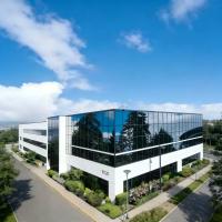 China Anti-Corrosion Multi-Storey Steel Structure Building 8-30m Span Q355 Steel Office Commercial Center for sale