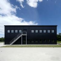 China Multi-storey Steel Structure Building Q355 Steel 800kg Load 8-30m Span Prefab Commercial Office for sale