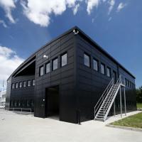 China Multi-storey Steel Structure Building Q355 Steel 800kg Load 8-30m Span Prefab Commercial Office for sale