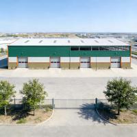 China Large Span Heavy Duty Steel Frame Warehouse 8-40m Custom Size Fireproof Anti-Corrosion for sale