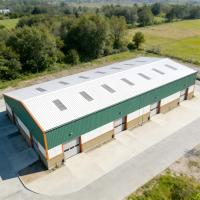 China Large Span Heavy Duty Steel Frame Warehouse 8-40m Custom Size Fireproof Anti-Corrosion for sale