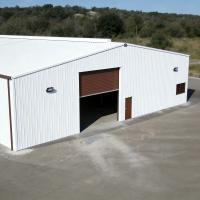 China Prefabricated Steel Structure Warehouse 30m Span Heavy Duty Storage Shed 500kg Load Capacity for sale