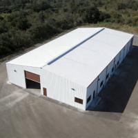 China Prefabricated Steel Structure Warehouse 30m Span Heavy Duty Storage Shed 500kg Load Capacity for sale