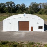 China Prefabricated Steel Structure Warehouse 30m Span Heavy Duty Storage Shed 500kg Load Capacity for sale