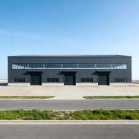 China Storage Customization Prefab Steel Frame Warehouse Easy Installation for Small & Medium Businesses Multi-layer Steel Warehouse for sale