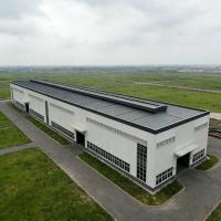 China Customizable Multi-Bay Steel Structure Workshop Industrial Factory Shed 8-40m Span 3-8m Eave Height for sale