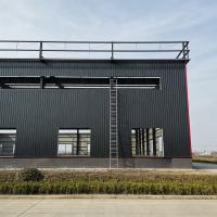 China Raw Material Storage Windproof Seismic Resistant Steel Structure Warehouse Heavy Duty Storage Building Customized for sale
