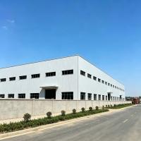 China Custom Steel Structure Warehouse 30m Span Fireproof Anti-Corrosion Prefab Logistics Center 500kg Load for sale