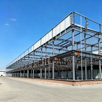 China Custom Steel Structure Warehouse 30m Span Fireproof Anti-Corrosion Prefab Logistics Center 500kg Load for sale