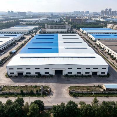 China Heavy Snow Capacity Steel Frame Warehouse Building with Corrugated Steel Roof and Wall Panels for Industrial Farm Shed for sale