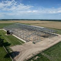China Well-ventilated Steel Structure Cattle House for Tropical Climate Regions Industrial Manufacturing Warehouse Shed Room for sale