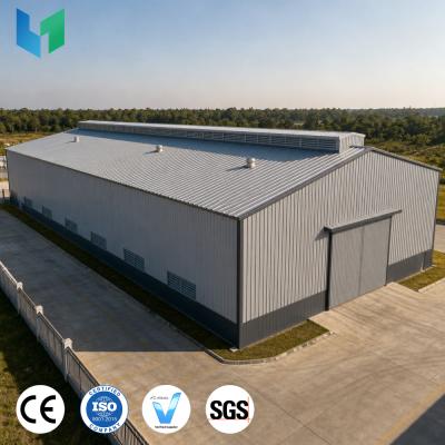 China Multi Span Steel Frame Production Hall Prefabricated Workshop with Roller Shutters and Sandwich Panel Roof for Assembly Line for sale