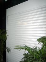 China Solid Insulated Aluminum Roller Shutter Door with 1.4mm Thickness and 80mm Width for Enhanced Security for sale
