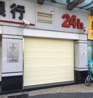 China Solid Insulated Aluminum Roller Shutter Door with 1.4mm Thickness and 80mm Width for Enhanced Security for sale