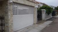 China Double Layer Aluminum Alloy Power Driven Soundproof Automatic Garage Door and Security Roller Shutter for sale