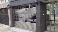 China Double Layer Aluminum Alloy Power Driven Soundproof Automatic Garage Door and Security Roller Shutter for sale