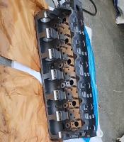 China Bright Silver Diesel Engine Cylinder Head Assembly Specially Designed For CAT C18 for sale