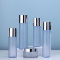 China Clear frosted PET bottle and jar featuring shiny silver plastic lid suitable for eco friendly and reusable cosmetic packaging solutions for sale