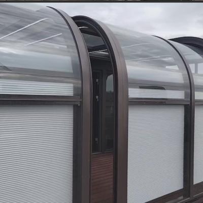 China Modern Low-E Glass Sunroom Retractable Curved Roof Solarium High Light Transmittance Waterproof Outdoor Wall Hotel Apartment for sale