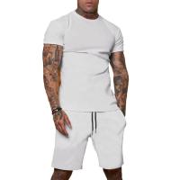 China Custom Logo Plus Size Tracksuit for Men Stretchable 2 Piece Outerwear Jogger Suit Short Sets for sale