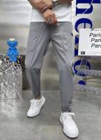 China Flat Front Style Mens Cargo Pants InStock with Custom Buttons Loose Fitness Joggers for sale