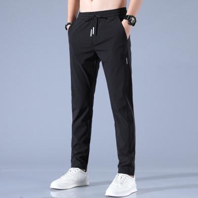 China Flat Front Style Men's Mid Jogging Pants for Basketball Men Thickness Lightweight for sale