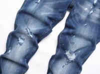 China Men's Worn Craft Slim Fit Mid Waist Baggy Jeans with Digital Printing Hanging Stickers for sale