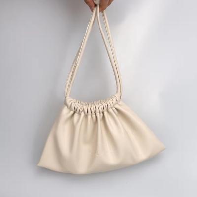 China Customized Color Luxury Lady PU Leather Drawstring Cosmetic Pouch with Customized Logo for sale