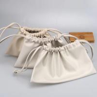 China Customized Color Luxury Lady PU Leather Drawstring Cosmetic Pouch with Customized Logo for sale