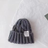 China Customized Logo Solid Color Japanese Twist Knitted Hat for Autumn and Winter Students for sale