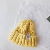 China Customized Logo Solid Color Japanese Twist Knitted Hat for Autumn and Winter Students for sale