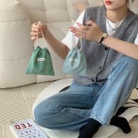 China Customized Color Woven Label Storage Drawstring Fabric Packaging Bag for All Seasons for sale