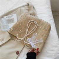 China Beach Grass Woven Single Shoulder Tote Bag with Beautiful Bow in Customized Color for sale