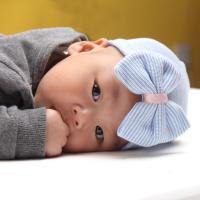 China 2022 Knitted Wool Baby Hat with Big Bow in Customized Color and Pattern Knitted for sale
