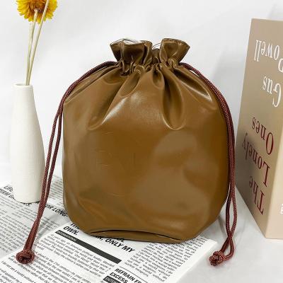 China Custom Logo Printed PU Leather Drawstring Bag For Customized Color Cosmetic Packaging for sale
