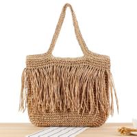 China 2024 Large Capacity Women Paper Straw Beach Tote Hand Bag With Tassel Newest Fashinable for sale