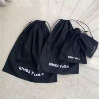 China Medium Black Muslin Calico Canvas Cotton Drawstring Pouch Bags with Customized Logo for sale