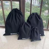 China Medium Black Muslin Calico Canvas Cotton Drawstring Pouch Bags with Customized Logo for sale