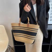 China Stylish Women Woven Beach Straw Handbag Casual Handmade Hollow Out Rattan Shoulder Bags for sale