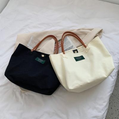 China Latest Fashion Custom Logo Canvas Pocket Large Capacity Student Single Shoulder Bag for sale