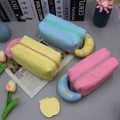 China Accepable OEM/ODM Makeup Bag Portable Cartoon Toiletry Waffle Cosmetic Bag for Girls for sale