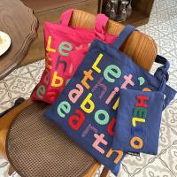 China Colorful Embroidery Letter Canvas Shoulder Bag A Functional and Fashionable Choice for sale