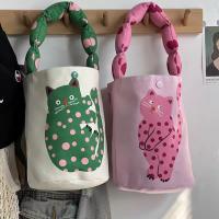 China Mini Cute Bucket Bag Canvas Tote Bag Front Pocket and Customized Design for sale