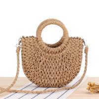 China Customized Logo One-shoulder Woven Beach Straw Bag for Women in Simple Round Design for sale