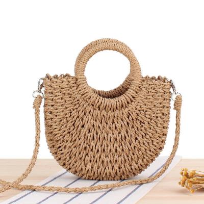 China Customized Logo One-shoulder Woven Beach Straw Bag for Women in Simple Round Design for sale