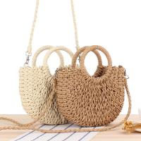 China Customized Logo One-shoulder Woven Beach Straw Bag for Women in Simple Round Design for sale
